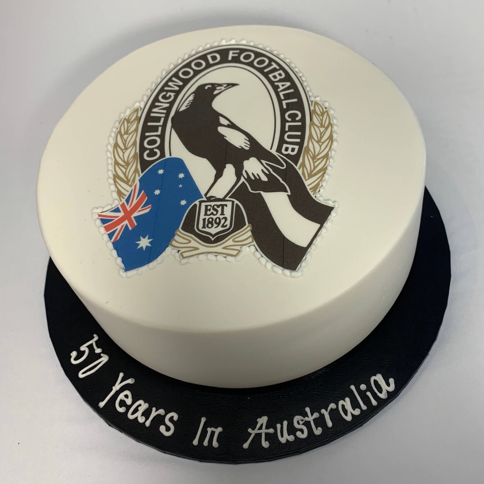 Collingwood Logo | Nikos Cakes